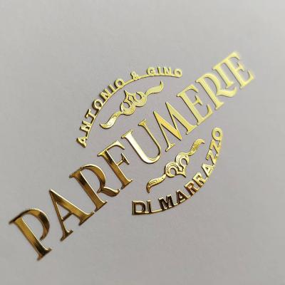 China Custom Logo Clear Metallic Stickers Waterproof Transparent Embossed Label Stickers for sale