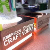 China Custom Showroom Display Props Stainless Steel Led Luminous Display Stand for Bottles for sale