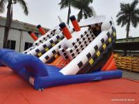China Ship Style Double Sided Inflatable Slides With Wave Stopper for sale