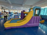 China Polyester Oxford Inflatable Purple Yellow Blue Slide With Toss Play for sale