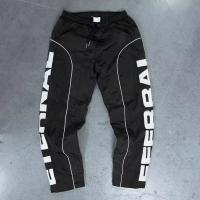 China Design Polyester Letter Wholesale Nylon Pants for Men Custom Patchwork Elastic Waistband Track Printing Flare Men'S Pants for sale