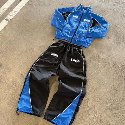 China Custom Manufacturers 3m Reflective Nylon Sweatsuit Joggers Windbreaker Streetwear Tracksuit Zip up Jacket and Pants Sets for Men for sale
