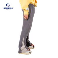 China Custom High Quality Men Jogger Sweat Pants Pant Flare Sweatpants Splatters Elastic Patchwork Graffiti Paint  Men Flare Pants for sale