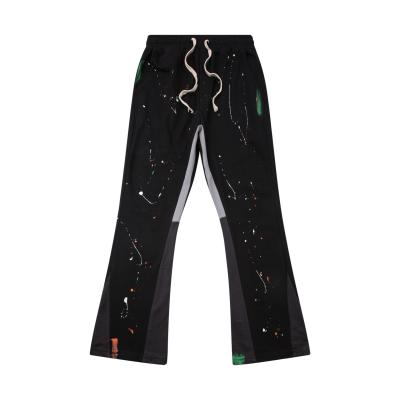 China Custom Logo New High Quality Flare Sweat Pants Men Wholesale Vintage Fashion Men'S Casual Drawstring Splash Graffiti Trousers for sale