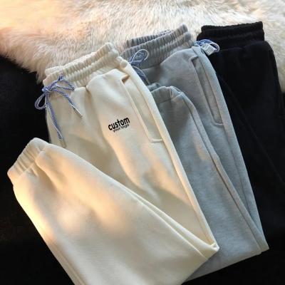 China Custom Logo Simple Style Legged Harlan Men'S Pants Jogging Winter Sports Plus Size Leisure Embroidery Warm Stacked Pants Men for sale
