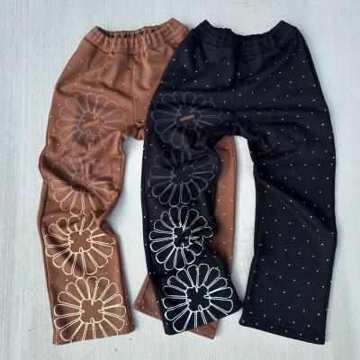 China Custom All Over Rhinestones French Terry Cotton Trousers Streetwear Dtg Printed Oversized Baggy Flared Sweat Pants for Men for sale