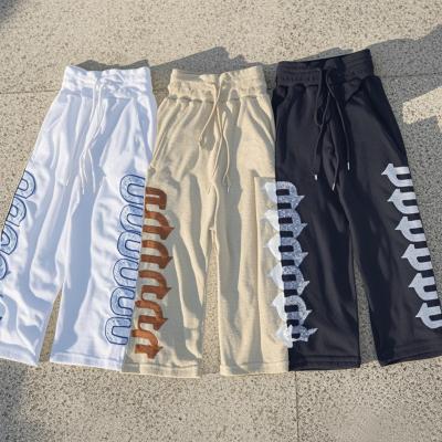 China Manufacturers Wholesale Custom Streetwear Distressed Acid Wash Sweat Pants Mens Double Waist Leg Flared Baggy Sweatpants for Men for sale