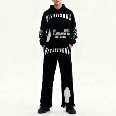 China Custom Unisex Applique Embroidery Patch Hem Cut Flared Stacked Joggers Tracksuit Sweatpants and Hoodie Set for Men for sale