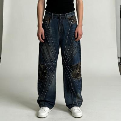 China Custom Wholesale Y2K Cut Wide Leg Flared Distressed Vintage Denim Pants Web Graphic Printed Logo Dark Blue Hip Hop Baggy Jeans for sale
