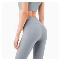 China Women's Yoga Leggings Breathable Spandex Nylon Fabric Solid Color Customizable Size And Logo Fitness Pants for sale