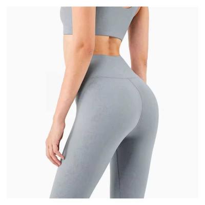China Women's Yoga Leggings Breathable Spandex Nylon Fabric Solid Color Customizable Size And Logo Fitness Pants for sale