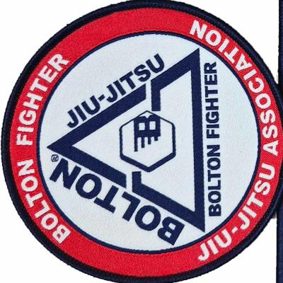 China Iron On Sew On Woven Patches Custom Logo Twill Fabric For BJJ Kimono Jackets for sale