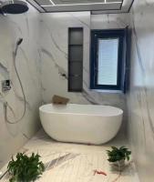 China 1200x2400mm Polished Porcelain Tile for Hotel Lobby Wall and Floor in Carrara White for sale