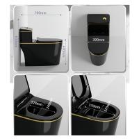 China Installation Floor Mounted Dual Flushing Siphon Flush Black Ceramic One Piece Toilet for sale