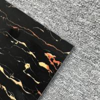 China Black Shiny Porcelain Floor Tile with Gold Veins Non Slip and 3D Wall Design for sale