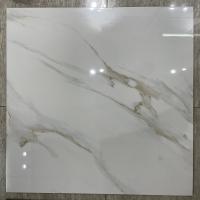China Apartment Flooring 600x600 Glazed Porcelain White Glossy Ceramic Calacatta Gold Tiles for sale