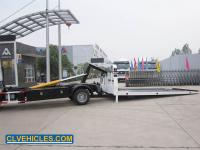 China 600P 130hp International Flatbed Tow Truck Isuzu Rollback Truck Diesel for sale