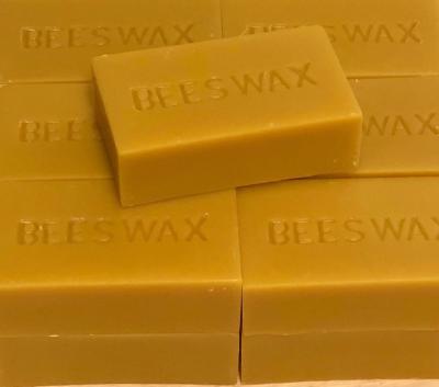 China OEM ODM Triple Filtered Beeswax 1 LB Block Customized Filtering Beeswax For Candles for sale