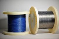China Ultra-Fine Metal Fiber Heating Wire - Bending Resistant, 4-61Ω Resistance Range, Low Voltage Insulated for Textile Integration for sale