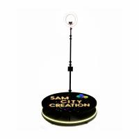 China Black Spinning 360 Photo Booth Machine Rotating Platform With Ring Light for sale