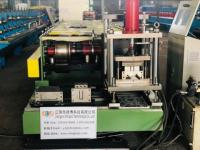 China Hydraulic Punching 1.0mm Shutter Door Roll Forming Machine With Touch Screen for sale