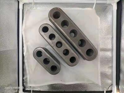 China Curved Post Tensioning Ductile Iron Wedge Block for 15.24mm & 12.7mm Strands with 1960 MPa Strength for sale