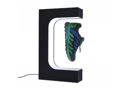 China ODM / OEM Magnetic Levitation Shoes Rotating Display Stand Acrylic Material for sale