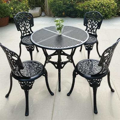 China Cast Iron Table And Chairs Perfect Combination of Strength and Elegance for Your Outdoor Space for sale