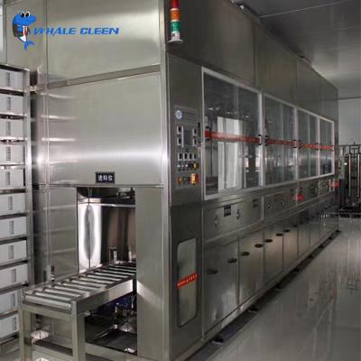 China Fully Automatic Ultrasonic Motor Parts Cleaner With PLC Control And Mechanical Arm for sale