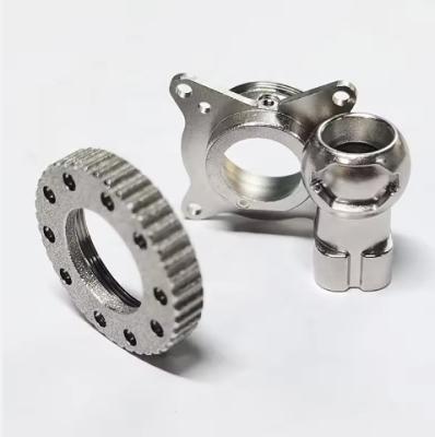 China Custom MIM Drone Parts 0.01kg Powder Metallurgy Components with 5000pcs MOQ and 7-15 Day Delivery for sale
