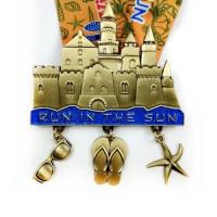 China Custom 3D Sports Gold Medal with Logo Embossed Shiny or Sandblasted Finish for sale