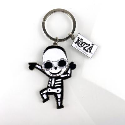China Custom Zinc Alloy Soft Enamel Skull Keychain 2 1/3 Inch Movable Spinning Design Promotional for sale