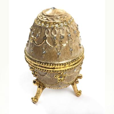 China Elegant Egg Shaped Rhinestone Jewelry Box with Velvet Lining Zinc Alloy 3D Design for sale