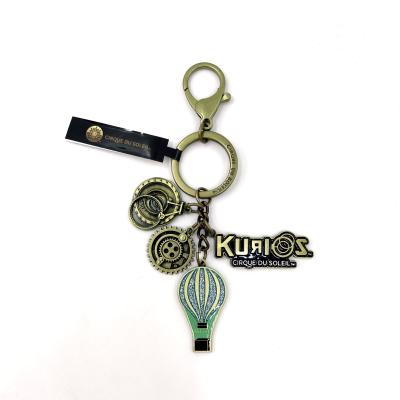 China Custom Antique Copper Glitter Keychain 25mm with Lobster Clip for Promotional Gifts for sale