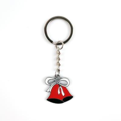 China Custom Soft Enamel Christmas Keychain 25mm Festive Bells Gingerbread House Design 10000pcs for sale