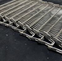 China Low Temperature Resistance 304 316 Stainless Steel Plain Weave Spiral Balance Woven Wire Mesh Belt for Ice Cream Transport for sale