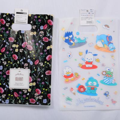 China Waterproof Die Cut Handle Plastic Bags 30x40cm Heavy Duty Handle Bags 5kg Capacity for sale