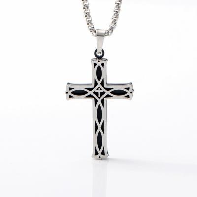 China New stainless steel jewelry with fashionable and personalized patterns, hollowed out necklace, simple men's cross pendant for sale