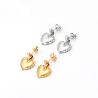 China Stainless steel heart-shaped women's gold earrings with personalized peach heart design earrings for sale