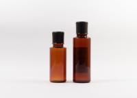 China 30ml Cylindrical PETG Plastic Serum Bottle With Black Lid for sale