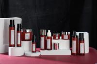 China Empty Cosmetic Packaging Set Red Frosted PET Face Cream Jar 15ml-300ml and Serum Bottle 20ml-1000ml for sale