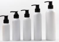 China Round Shoulder PET Plastic Bottle 1000ml with White Pump Orange Body Shampoo for sale