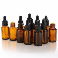 China 10ml Amber Cosmetic Bottles Round Screw Cap for Skincare Essential Oils Perfumes for sale