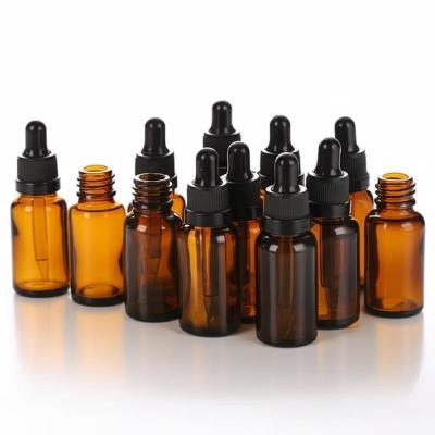China 10ml Amber Cosmetic Bottles Round Screw Cap for Skincare Essential Oils Perfumes for sale