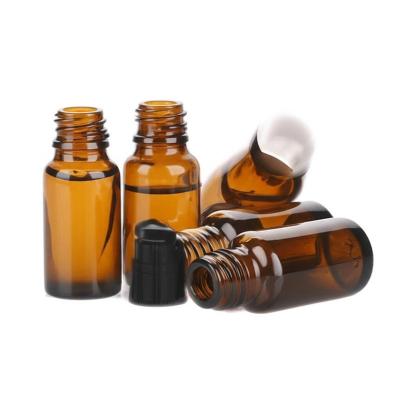 China 30ml Amber Glass Cosmetic Bottles Round Screw Cap for Skincare Essential Oils for sale