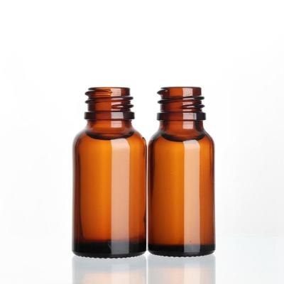 China Amber Cosmetic Bottles 10ml to 100ml Screw Cap Round Glass for Essential Oils and Skincare for sale