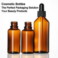 China Amber Cosmetic Bottles 10ml 30ml 50ml Round Glass Screw Cap for Skincare Essential Oils for sale