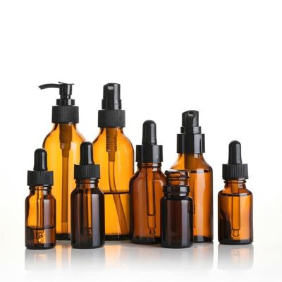 China Amber Cosmetic Bottles 10ml to 100ml Round Screw Cap for Skincare Essential Oils Perfumes for sale
