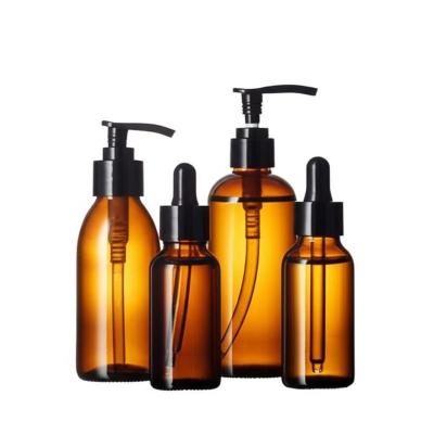 China Amber Cosmetic Bottles 10ml 30ml 50ml Screw Cap Round Glass for Skincare Essential Oils for sale