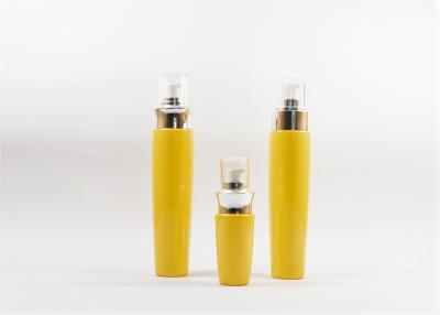 China Glossy Yellow PET Plastic Cosmetic Bottles 40ml 80ml 120ml for Lotion Toner for sale